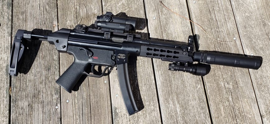 mp5 suppressor tri lug